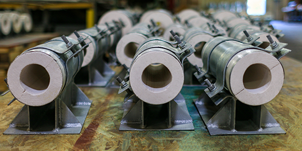 Insulated Pipe Supports for a High Temperature Pipeline by Pipe Shields ...